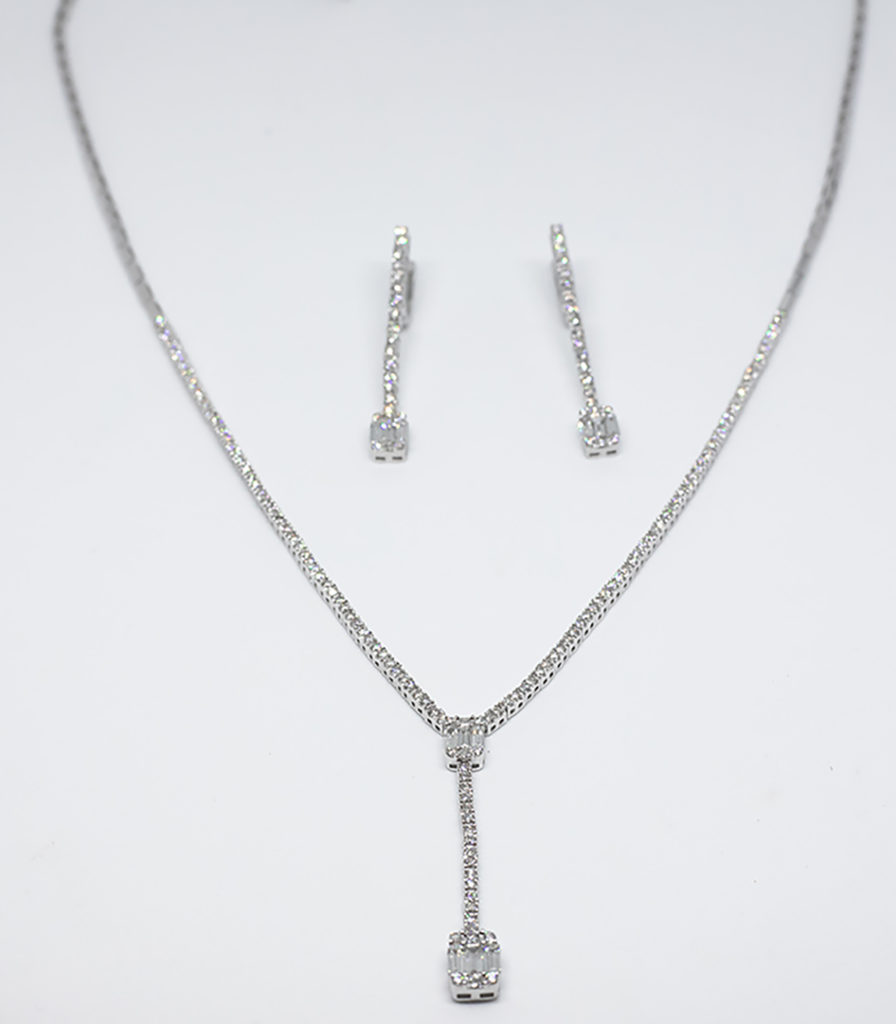 PARURE DE MARIAGE EN OR BLANC 18K SERTIE DE DIAMANTS | Lemusee